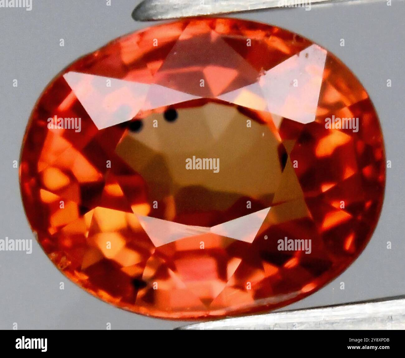 Radiant Orange Gemstone with Sparkling Facets Stock Photo - Alamy