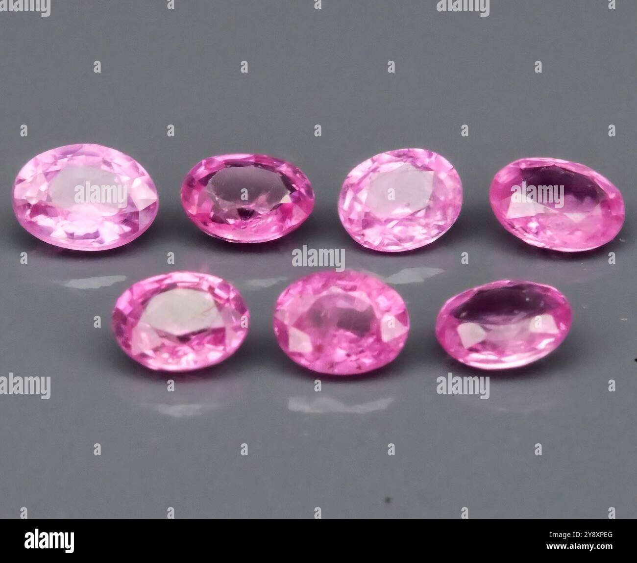 Exquisite Collection of Sparkling Pink Gemstones Displayed Elegantly ...