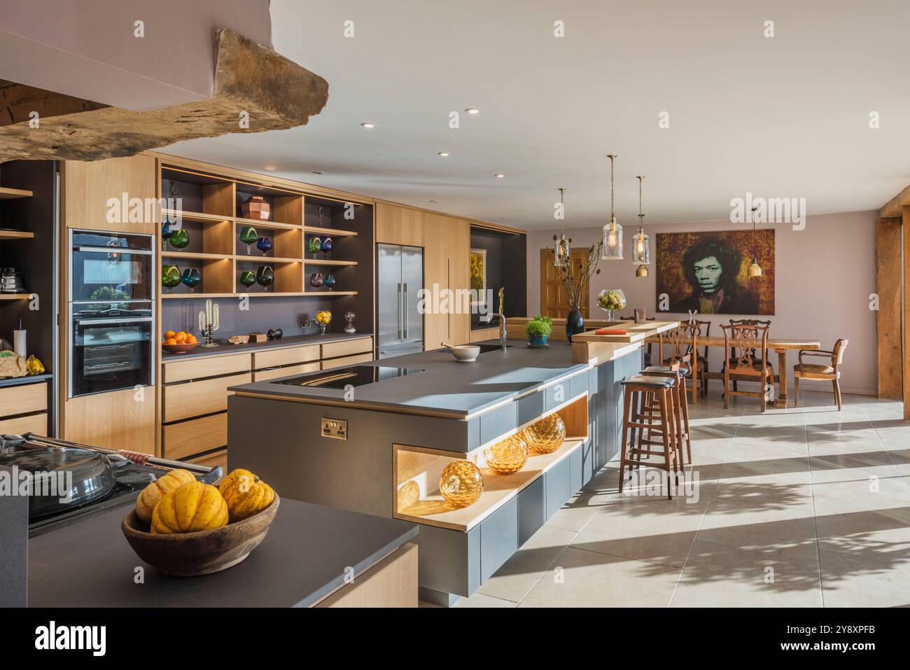 Grey worktop with built in glassware storage in modern designer open ...