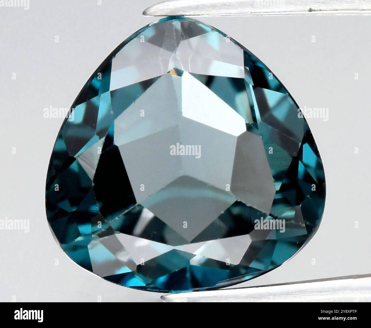 Sparkling Teal Gemstone Captured in Pristine Clarity Stock Photo - Alamy