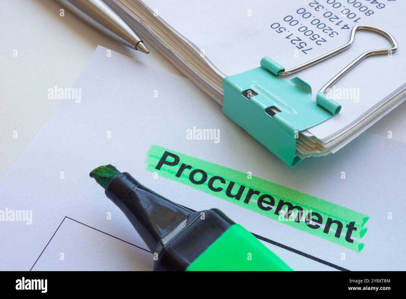 Stack of documents with label procurement. Symbolizes supply chain ...