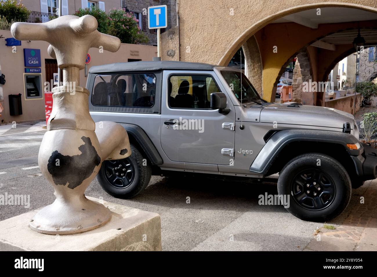 Jeep car vehicle refuel large tap Stock Photo - Alamy