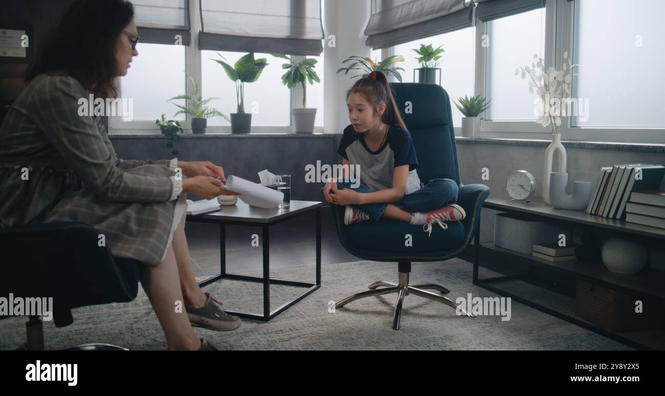 Female child psychologist shows illustrations hi-res stock photography ...
