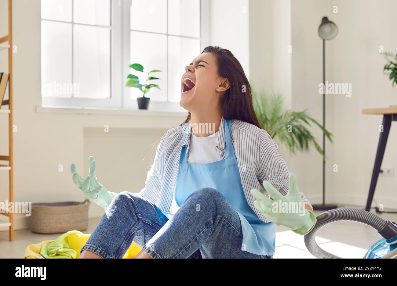 Female cleaner crying in anger, unhappy housewife, woman in emotional ...