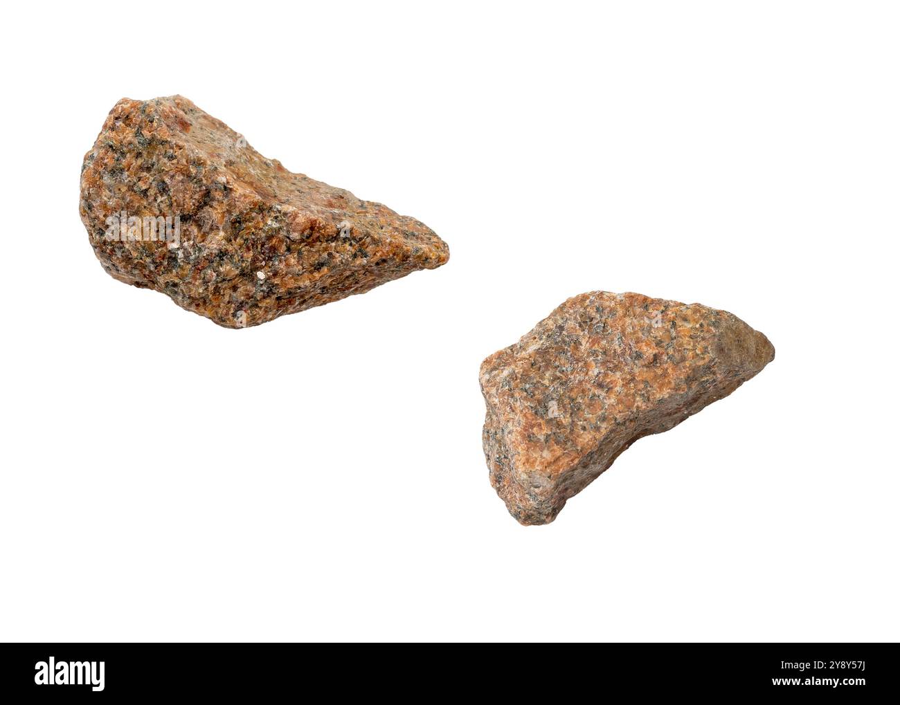 Two pieces of broken falling stones isolated on white Stock Photo - Alamy