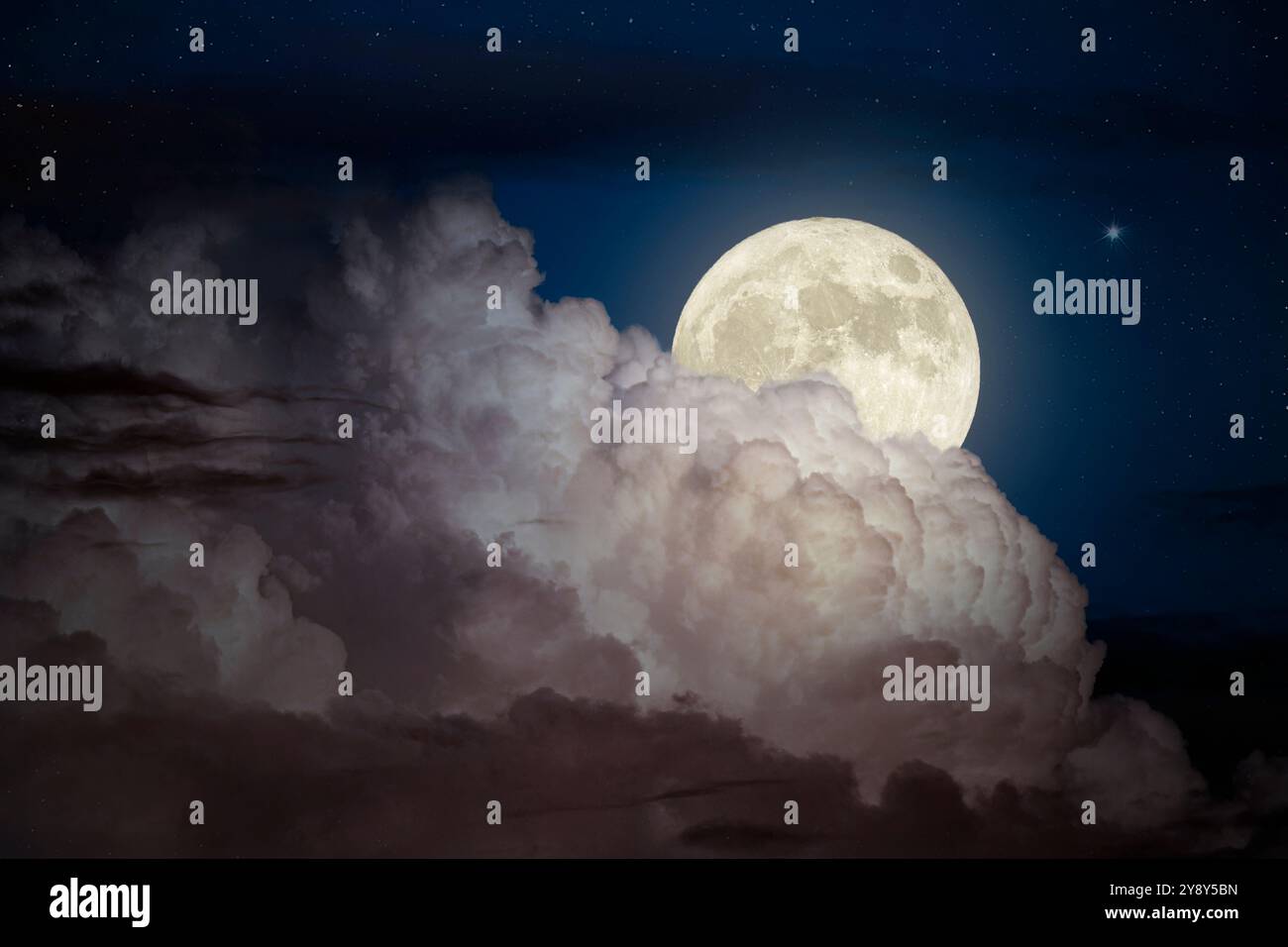 Full moon covered by a strong cloud in a starry night or dusk Stock ...