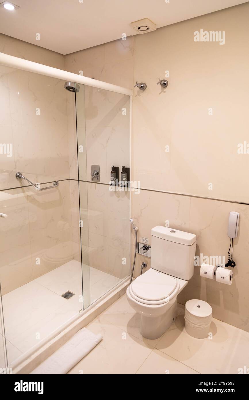 Very clean and organized bathroom with white toilet Stock Photo - Alamy