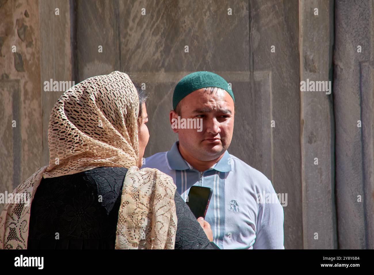 Samarkand, Uzbekistan; September 18, 2024:a woman in a traditional veil ...