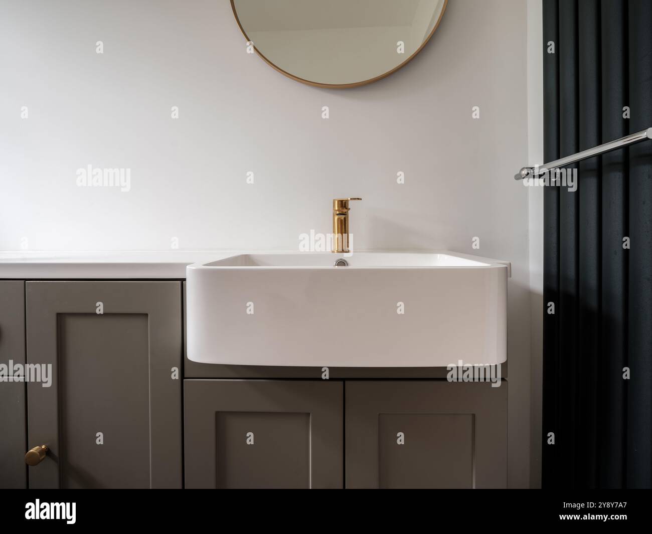 Luxury modern washroom and cloakroom detail with basin and contemporary ...