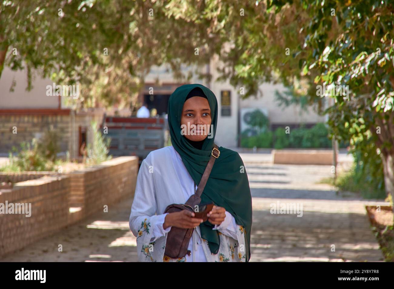 Khiva,Uzbekistan; September,21,2024:a Muslim woman with dark skin ...
