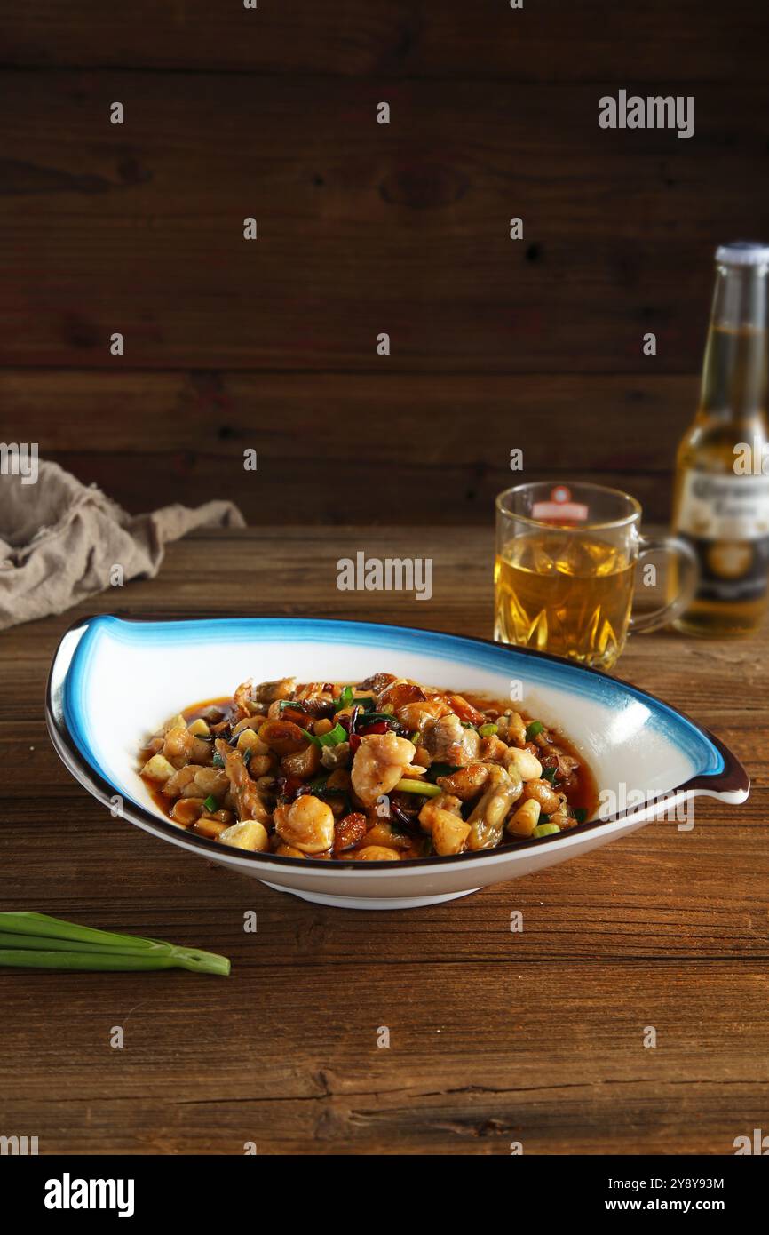 Frog with Pickled Pepper, bullfrog in sour soup Stock Photo - Alamy