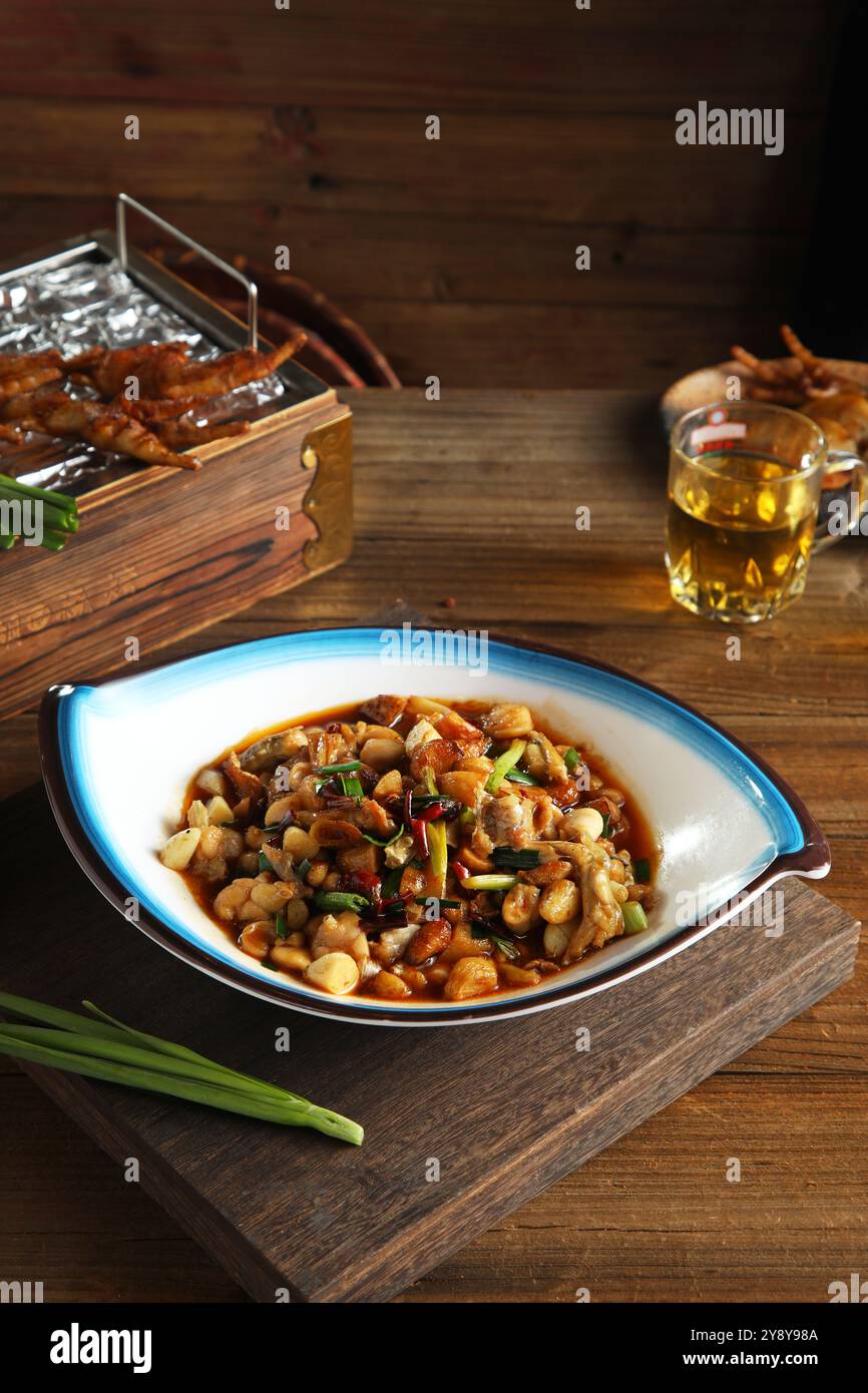 Frog with Pickled Pepper, bullfrog in sour soup Stock Photo - Alamy