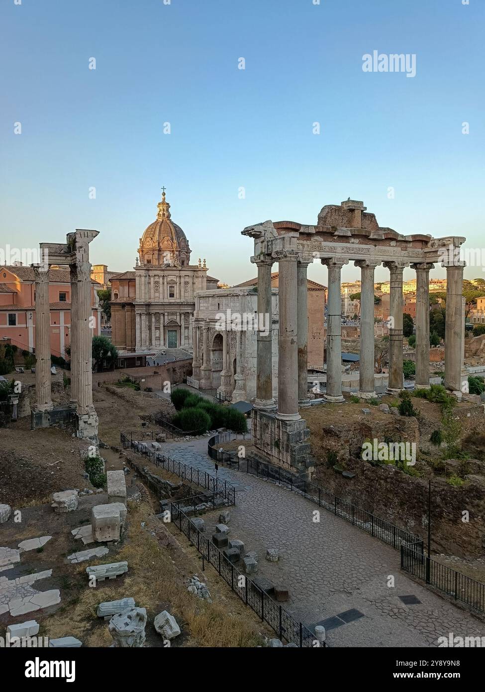 view of the Roman forum, in the background the facade of the church of ...