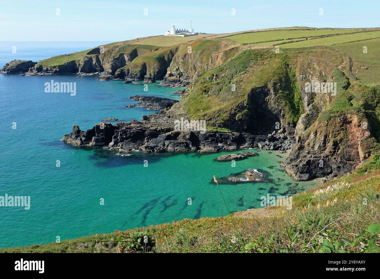 Housel Cove and Lizard Lighthouse on Bumble Rock, on the Lizard ...