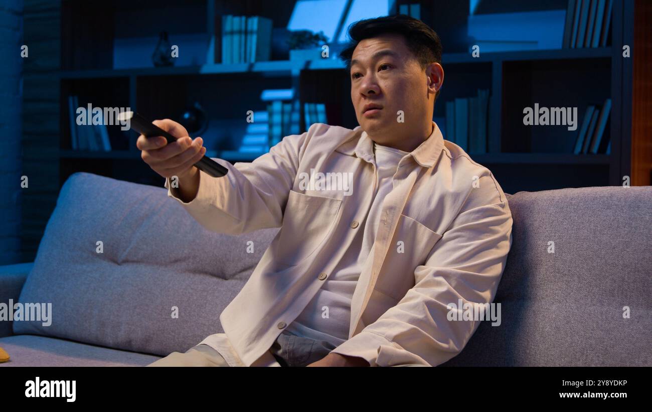 Bored dissatisfied sad irritated lonely Asian middle-aged man Korean ...