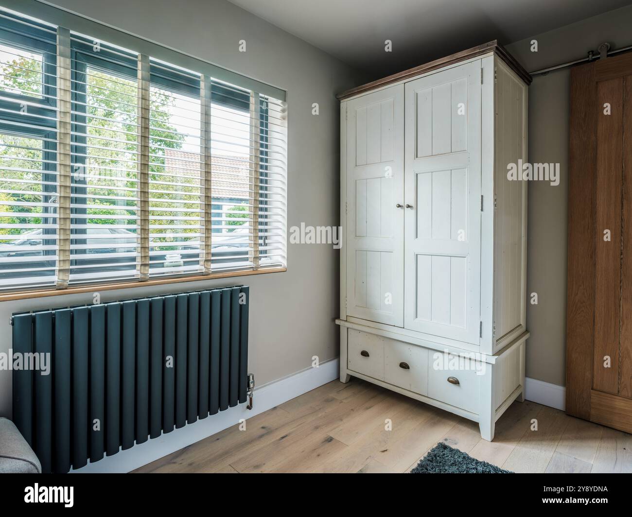 Modern contemporary radiator detail within house interior with ...