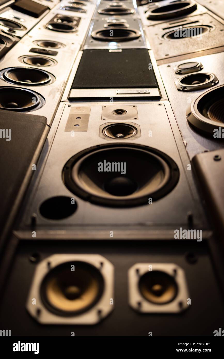 Stacked sound speakers in a big room Stock Photo - Alamy