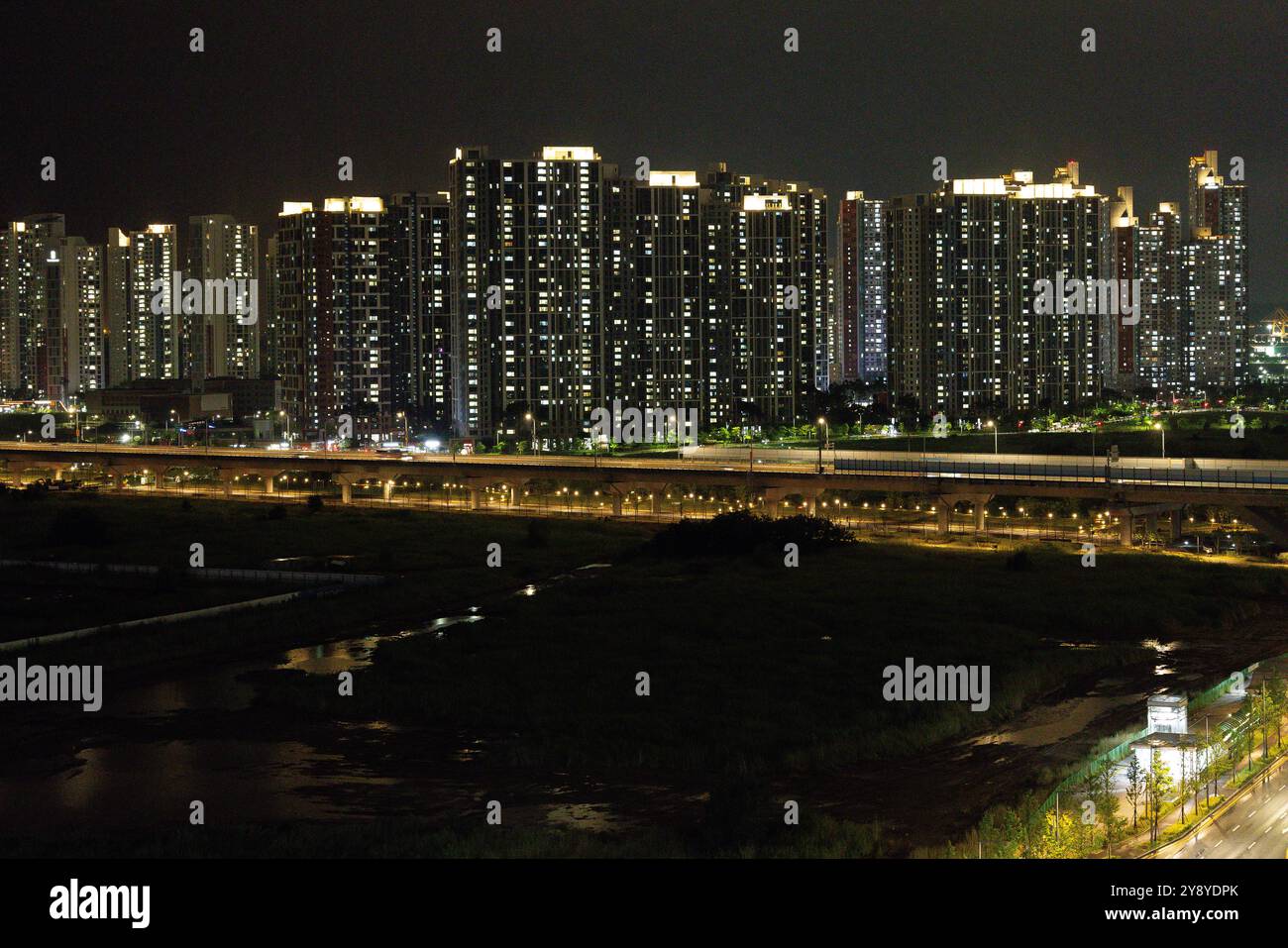 Skyscrapers at night with empty building plots. Shot in South Korea ...
