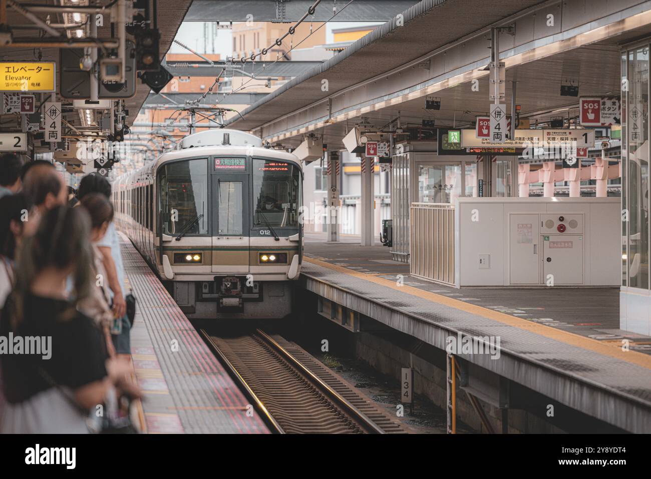 Train approaching central station. Shot in Japan Stock Photo - Alamy