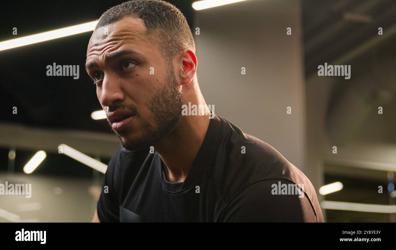 African American man lift dumbbell in gym sporty guy sport male trainer ...