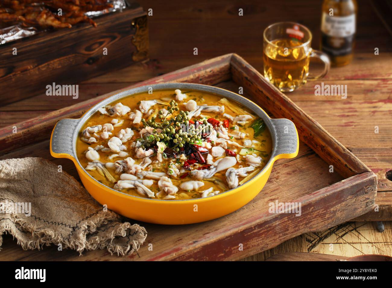 Frog with Pickled Pepper, bullfrog in sour soup Stock Photo - Alamy