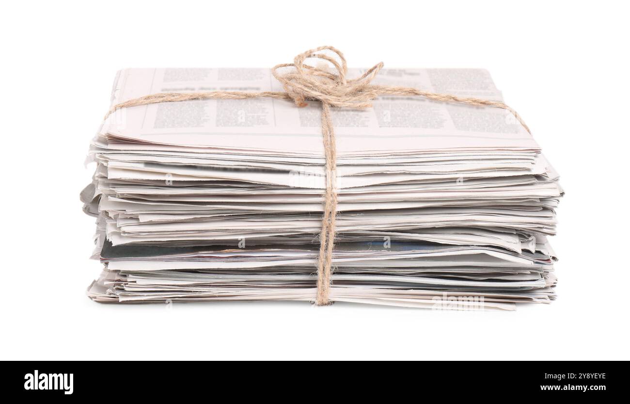 Stack of many newspapers isolated on white Stock Photo - Alamy