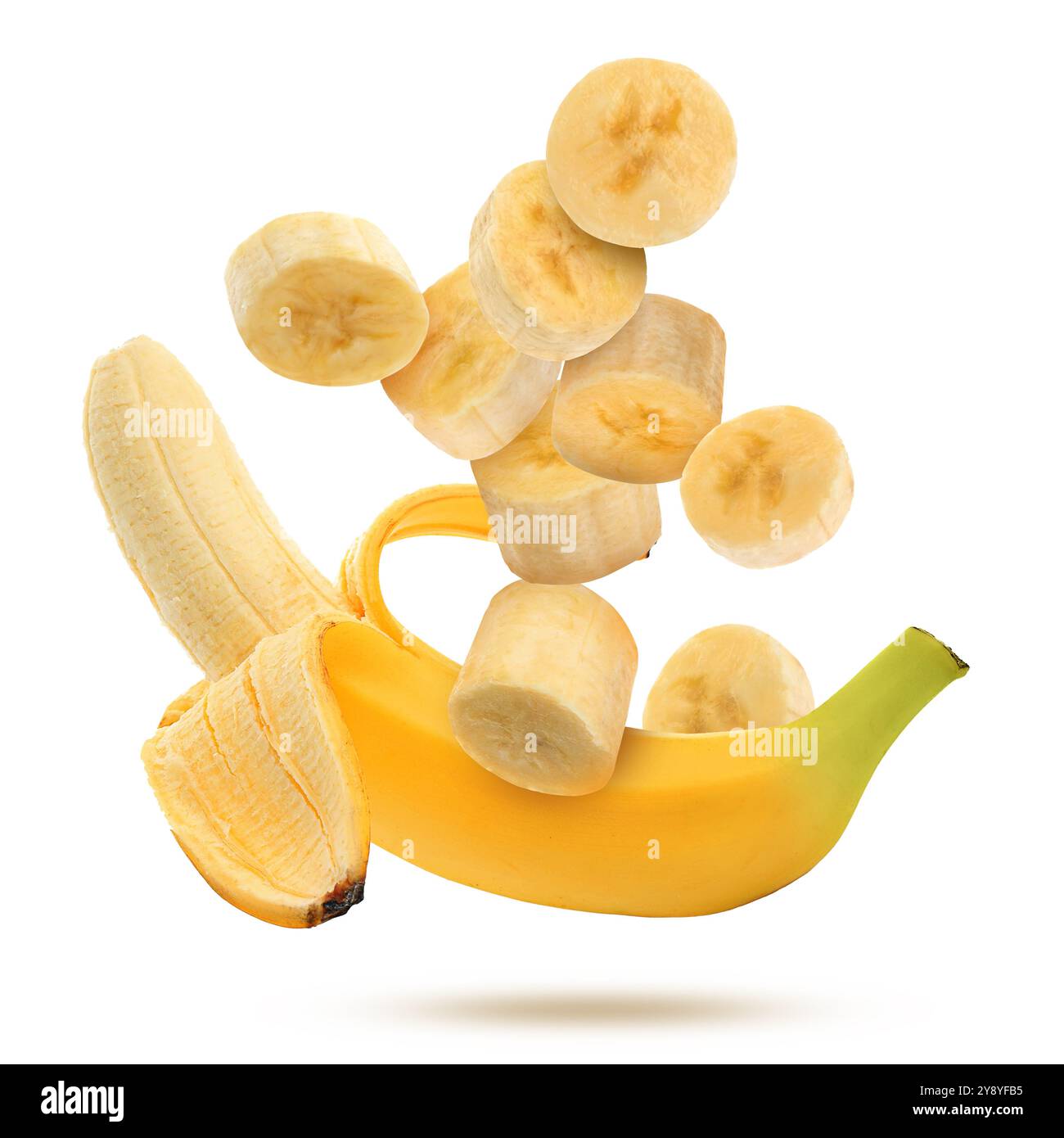 Fresh ripe bananas falling on white background Stock Photo - Alamy