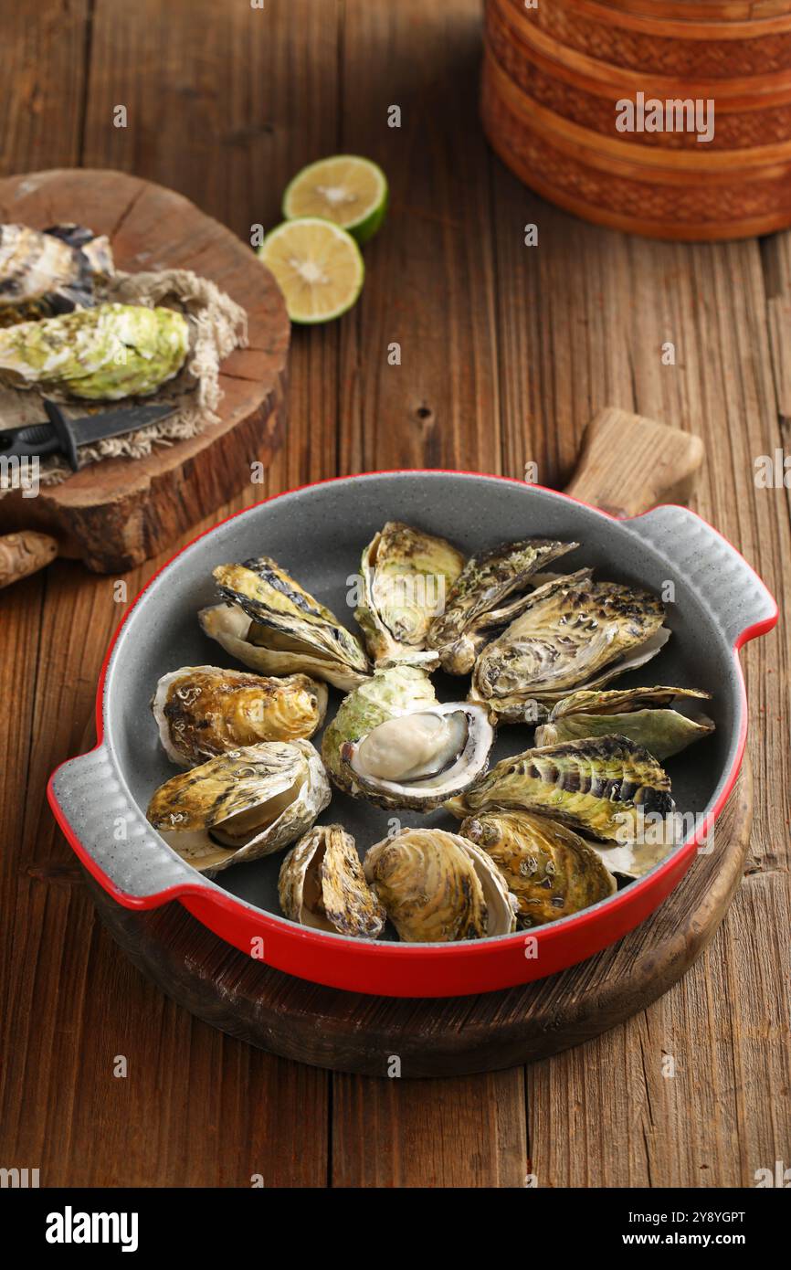very fresh steamed oysters in shell Stock Photo - Alamy
