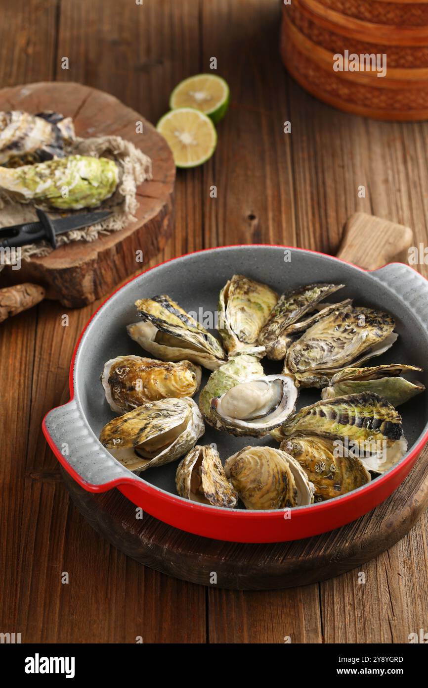 very fresh steamed oysters in shell Stock Photo - Alamy