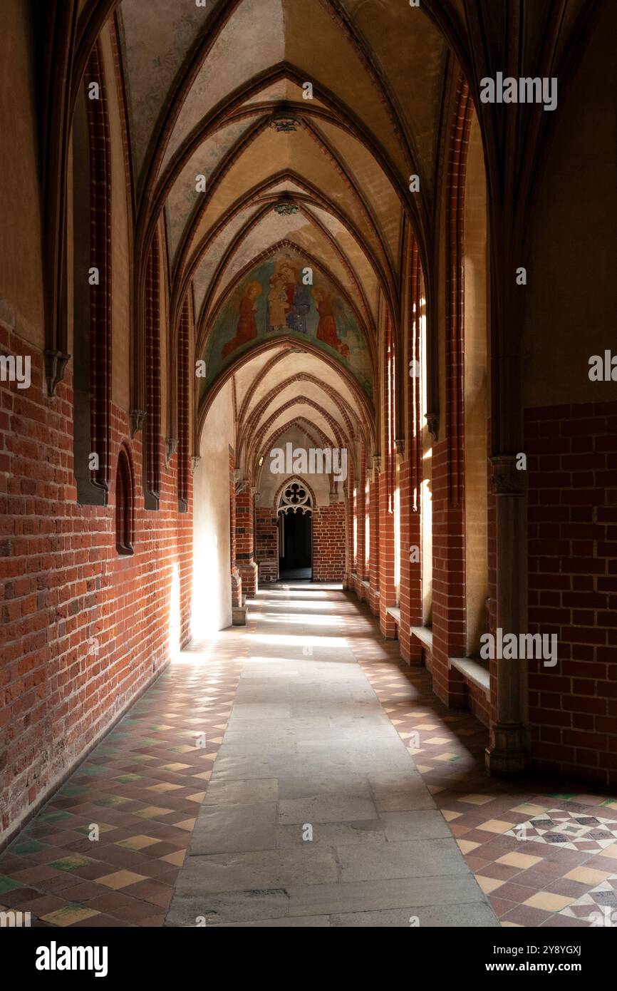 Darken passageway illuminated by outdoor light at medieval castle Stock ...