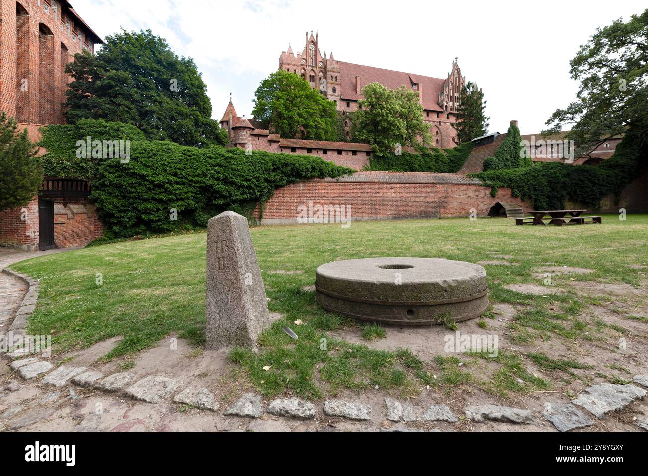 Massive medieval structure seen from a courtyard Stock Photo - Alamy