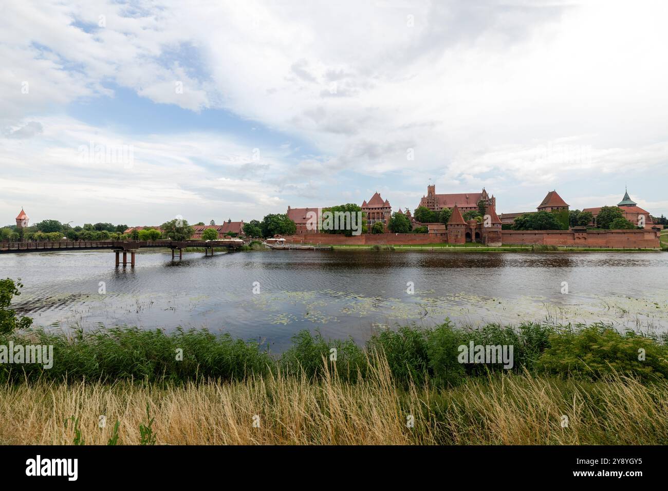 Massive medieval structure seen acorss from river Stock Photo - Alamy