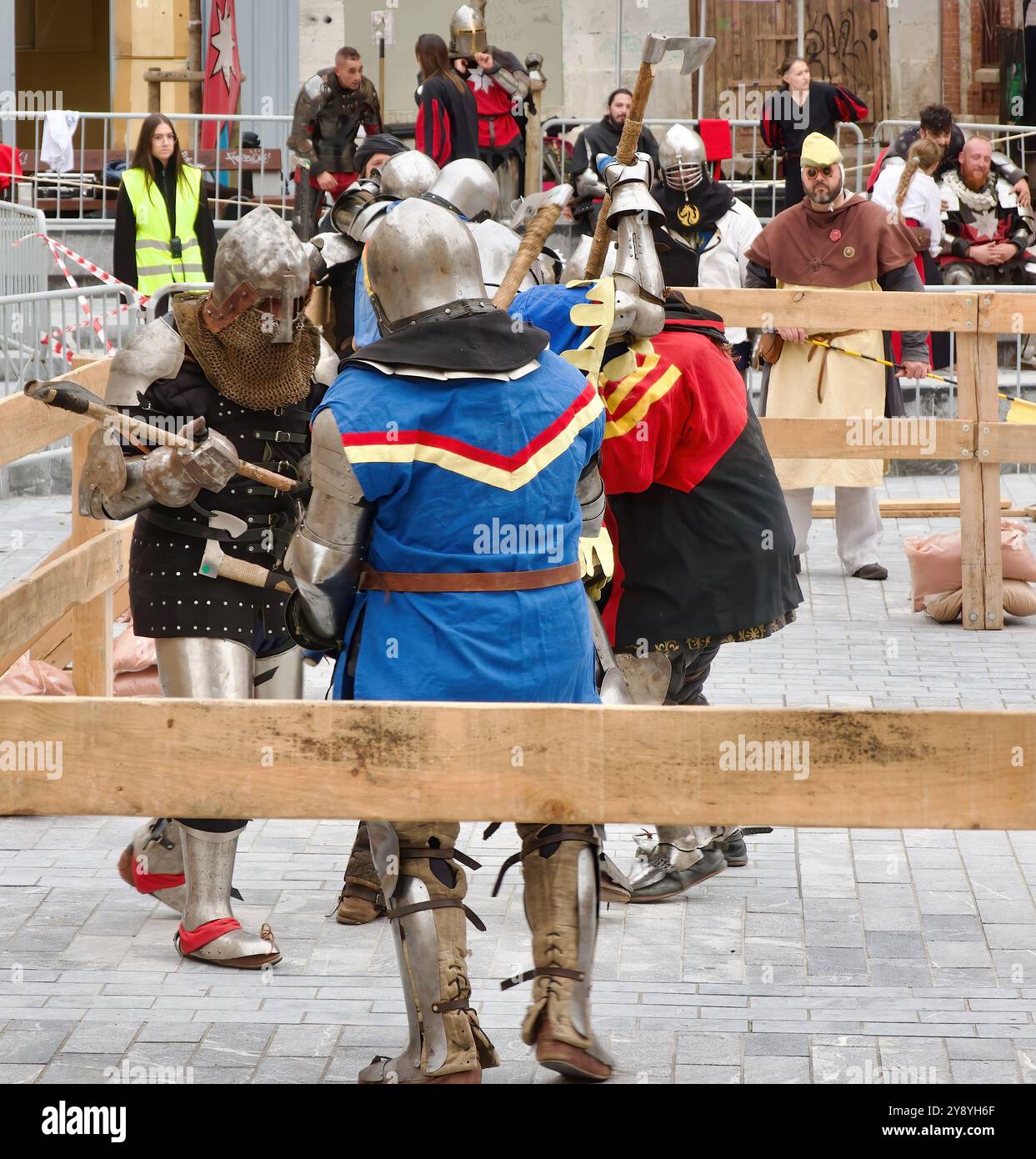 Reenactment of medieval knights in armour fighting in traditional ...