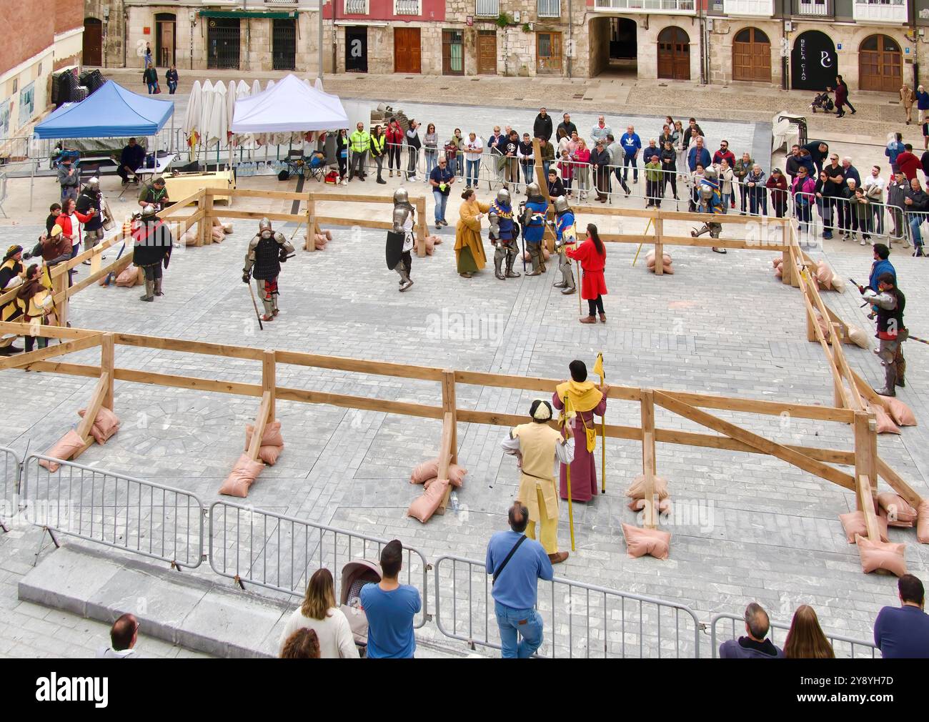 Reenactment of medieval knights in armour fighting in traditional ...