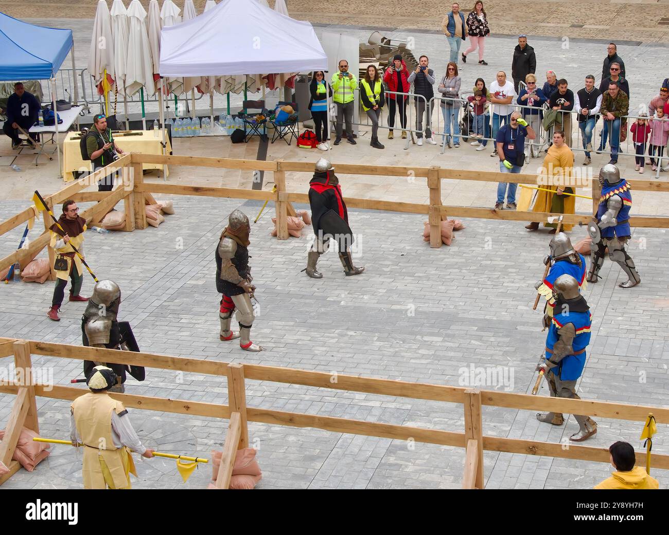 Reenactment of medieval knights in armour fighting in traditional ...