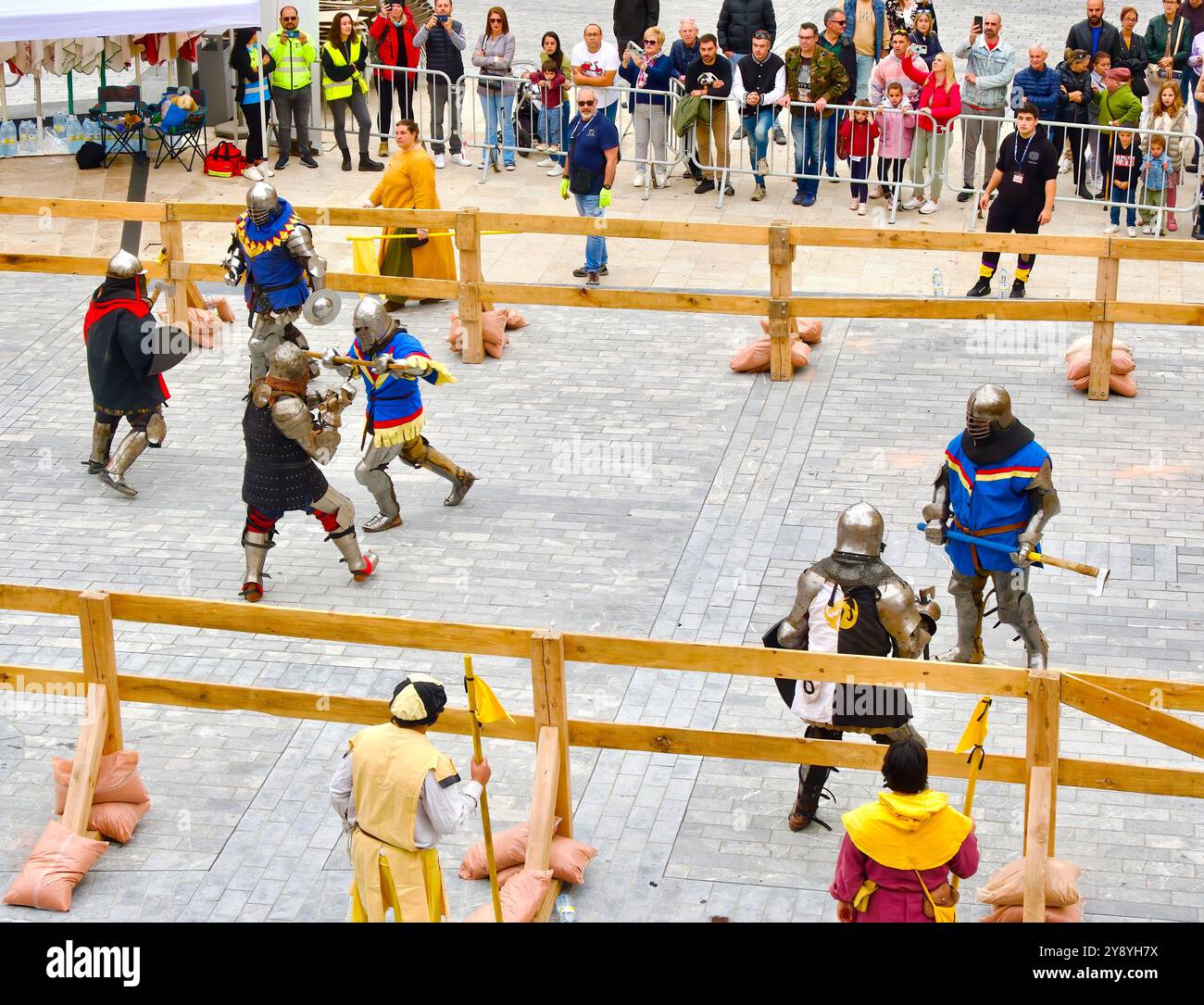 Reenactment of medieval knights in armour fighting in traditional ...