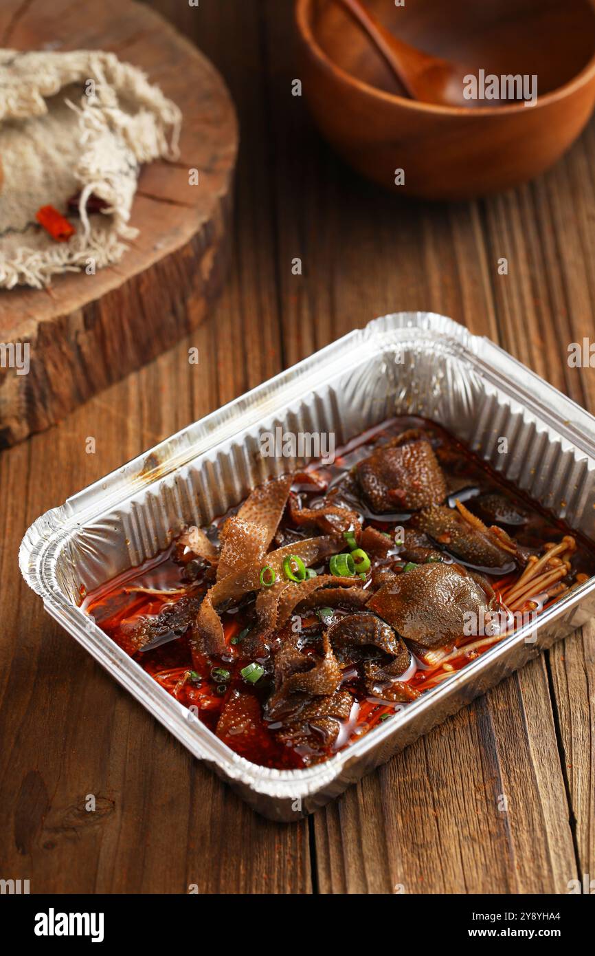 Shredded beef tripe tin foil box Stock Photo - Alamy