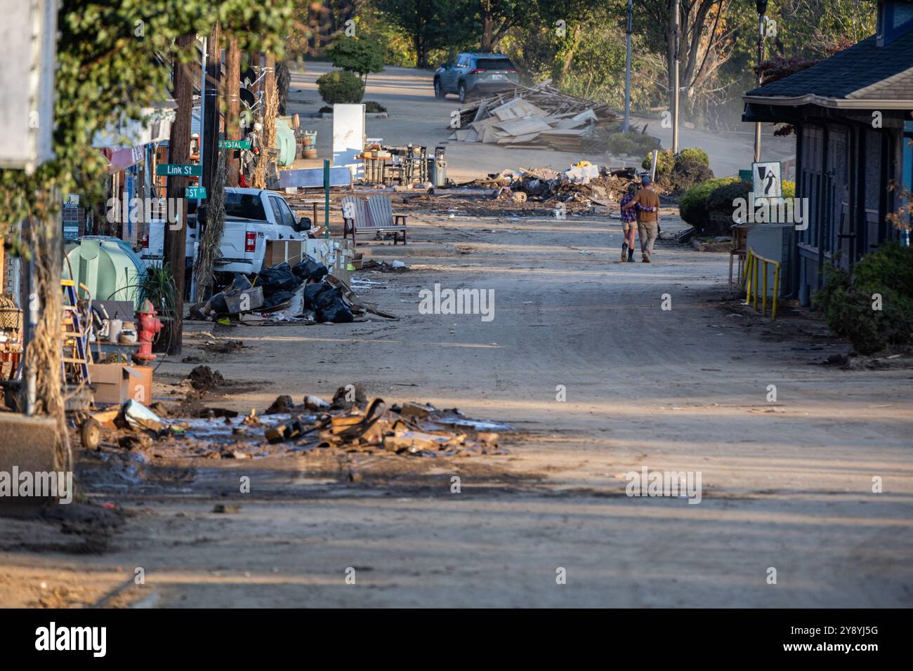 SPRUCE PINE, NORTH CAROLINA - OCTOBER 4: A couple walk down Locust ...