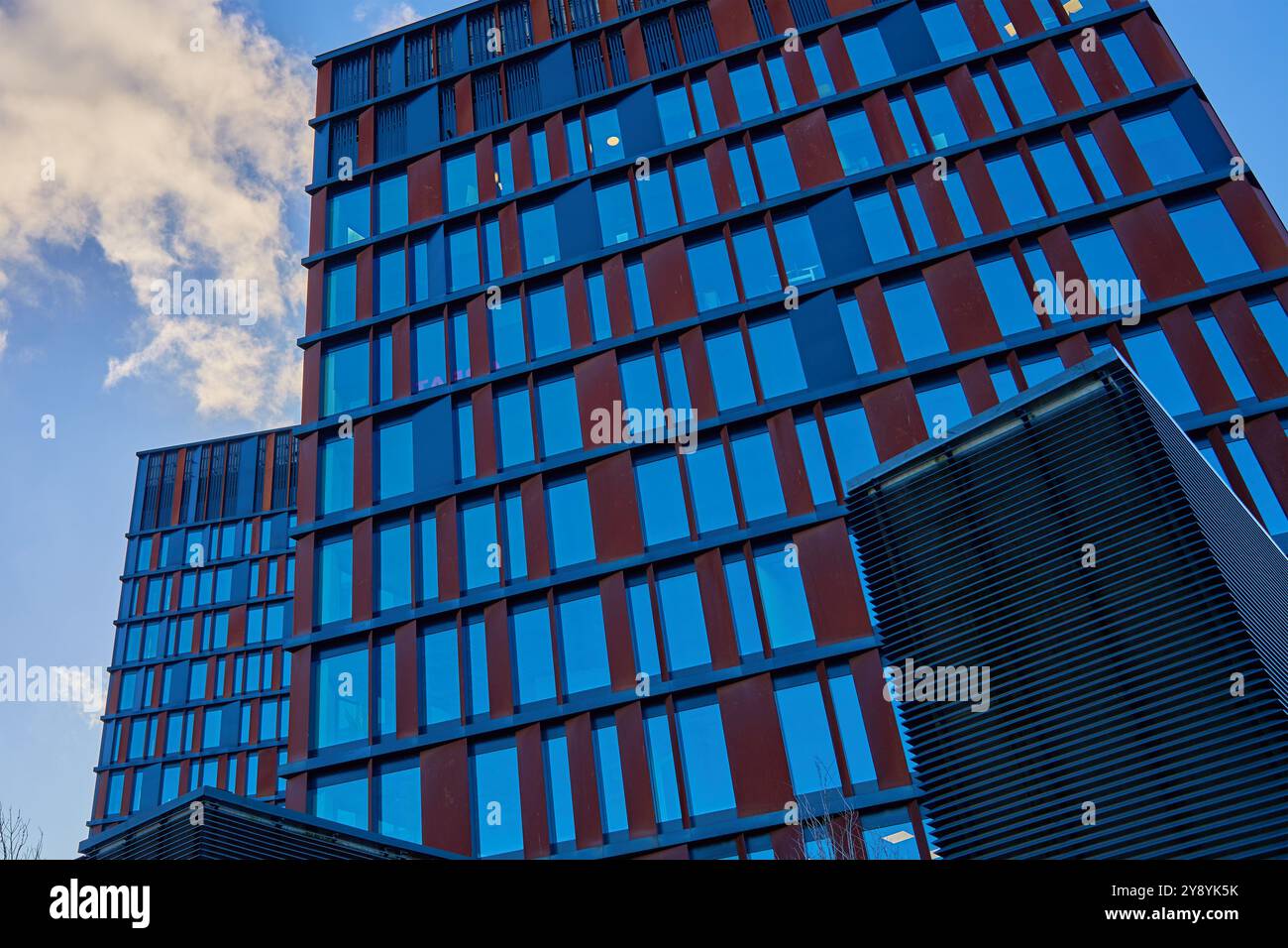 Contemporary office building with geometric facade. Contemporary ...