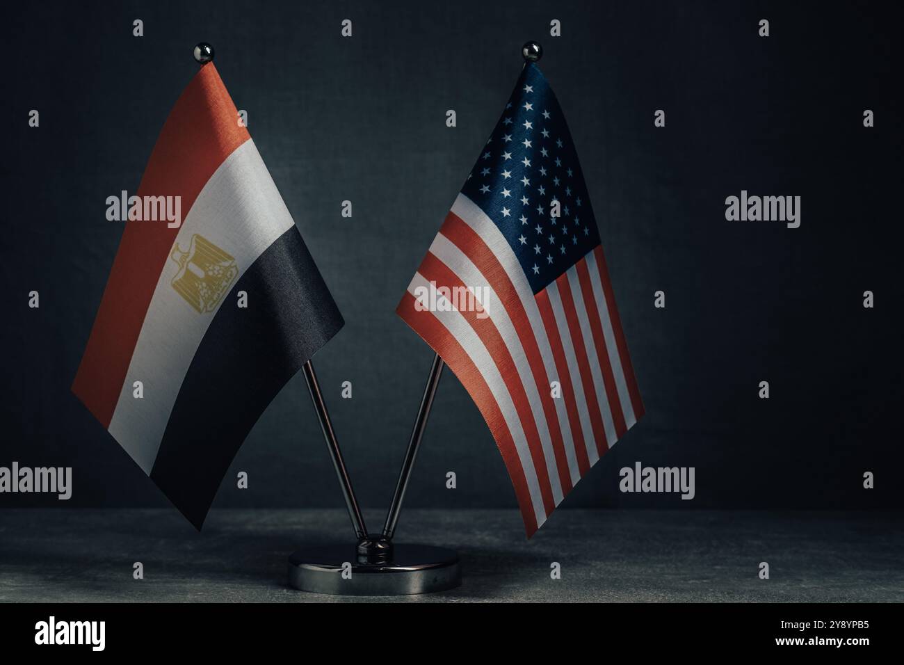 Table flags United States America and National Flag Egypt on dark ...
