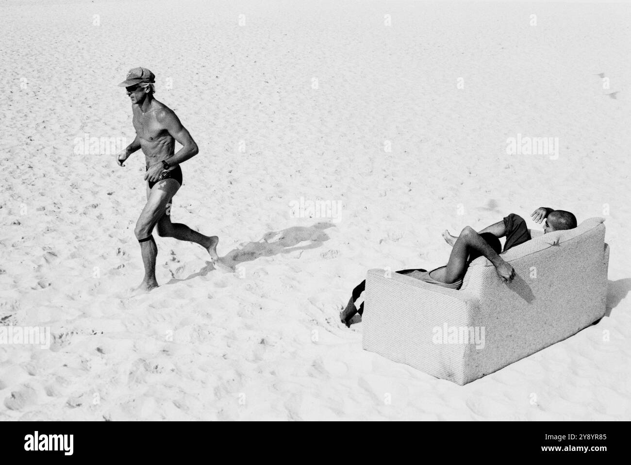 Bondi Beach early morning jogger a lean fit Australian running though ...
