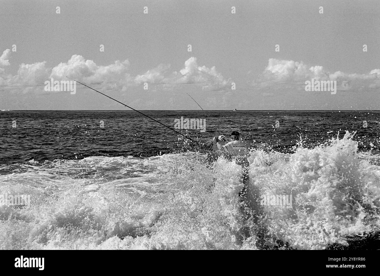 Son father fishing in Black and White Stock Photos & Images - Alamy
