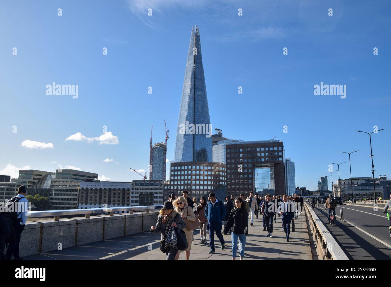 London, UK. 11th September 2024. People walk along London Bridge past ...
