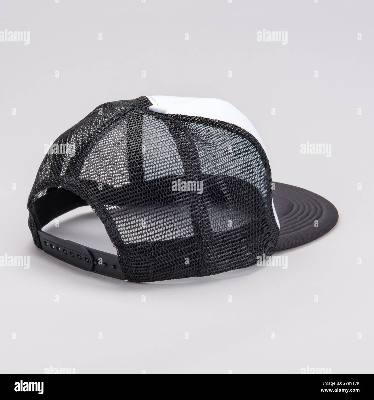 side view of Black Mesh Baseball cap with white front on grey ...