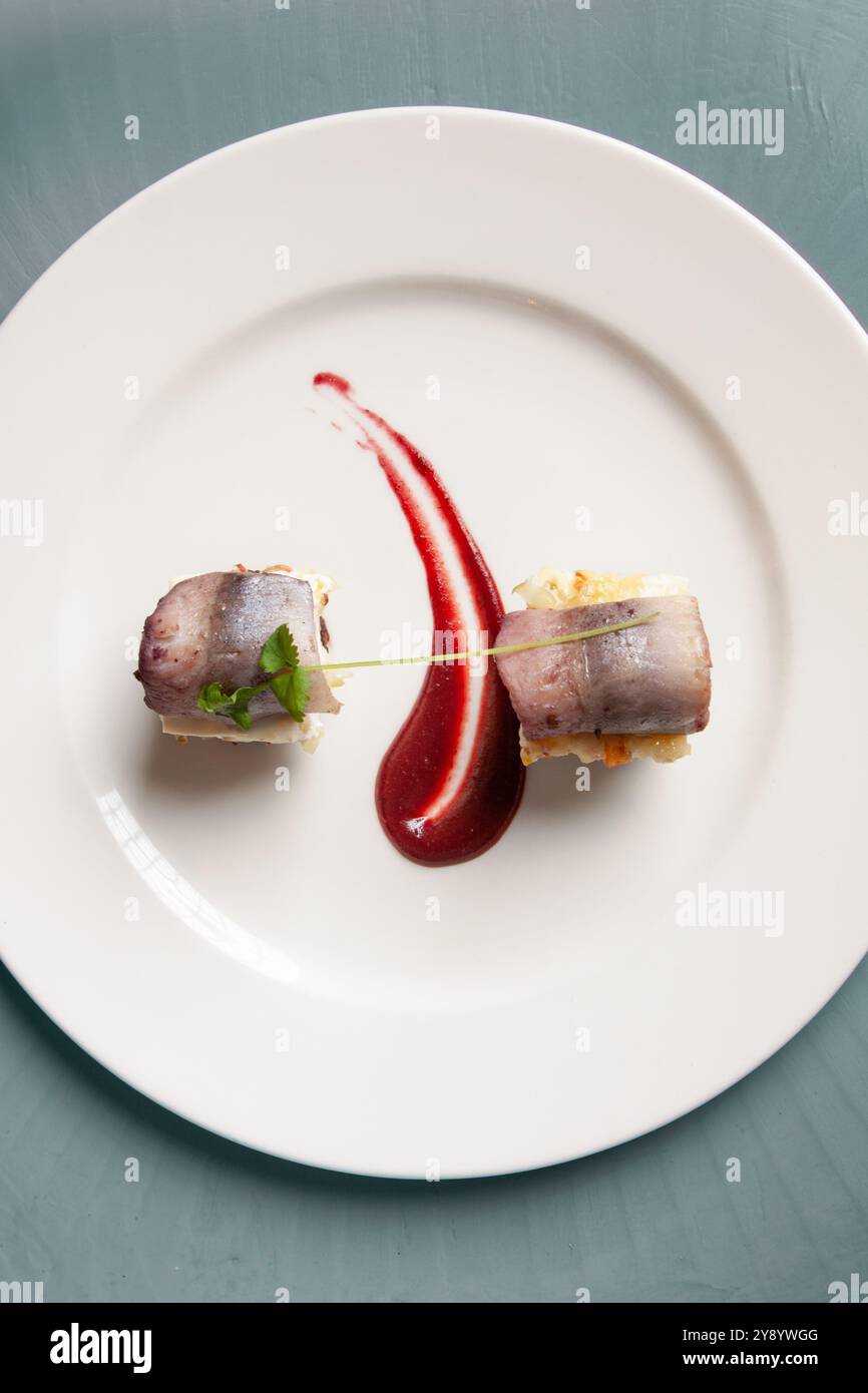 Gourmet pickled herring appetizer at fine dining Polish restaurant ...