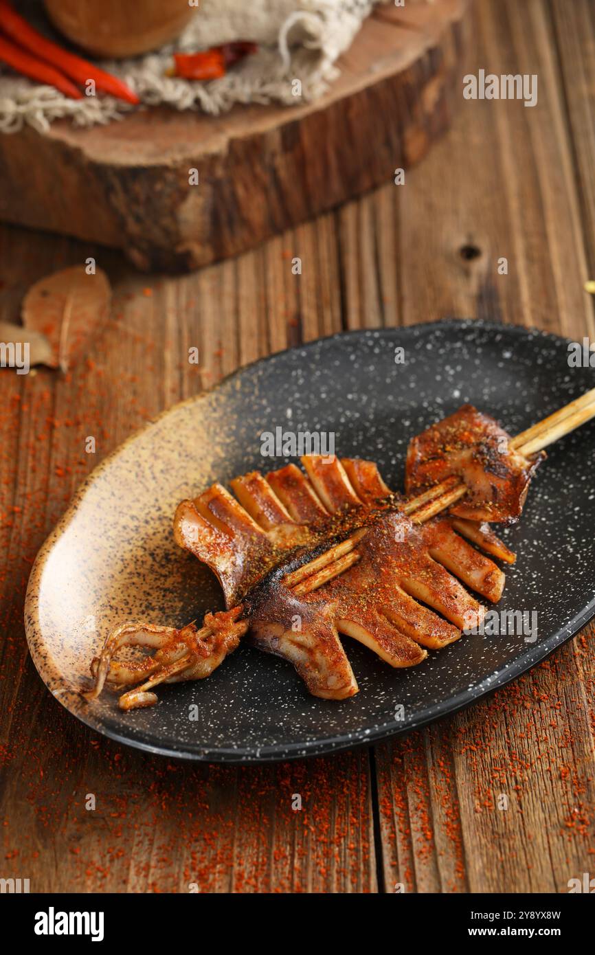 Charcoal-grilled Cuttlefish in spicy sauce,Shashlik. Kebab Stock Photo ...