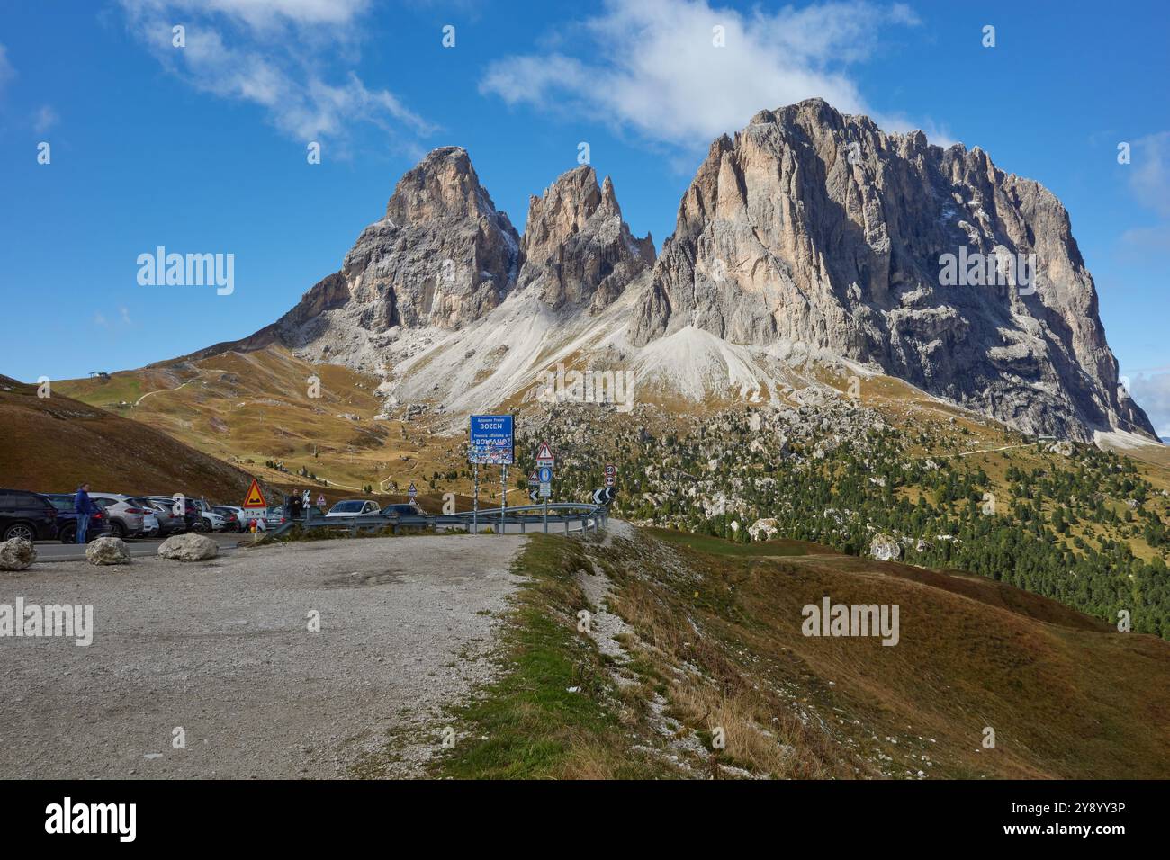 A sunny autumn day on the Sella Pass, with a view of the Sella range of ...
