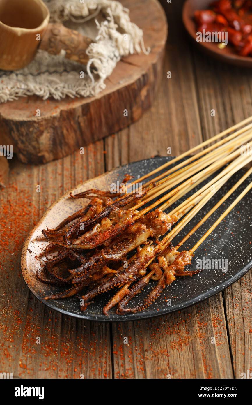 Charcoal-grilled Cuttlefish squid in spicy sauce,Shashlik. Kebab Stock ...