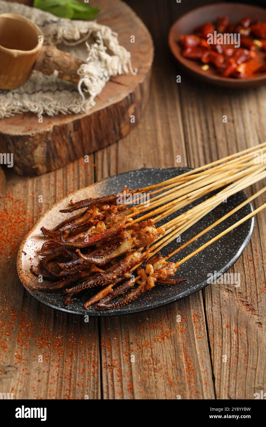 Charcoal-grilled Cuttlefish squid in spicy sauce,Shashlik. Kebab Stock ...
