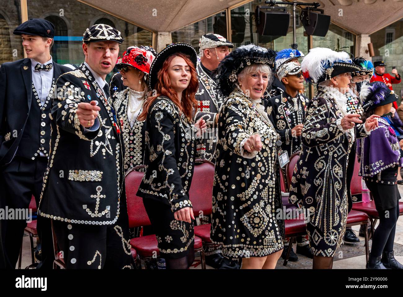 A Group of Pearly Kings and Queens Singing and Dancing To Traditional ...